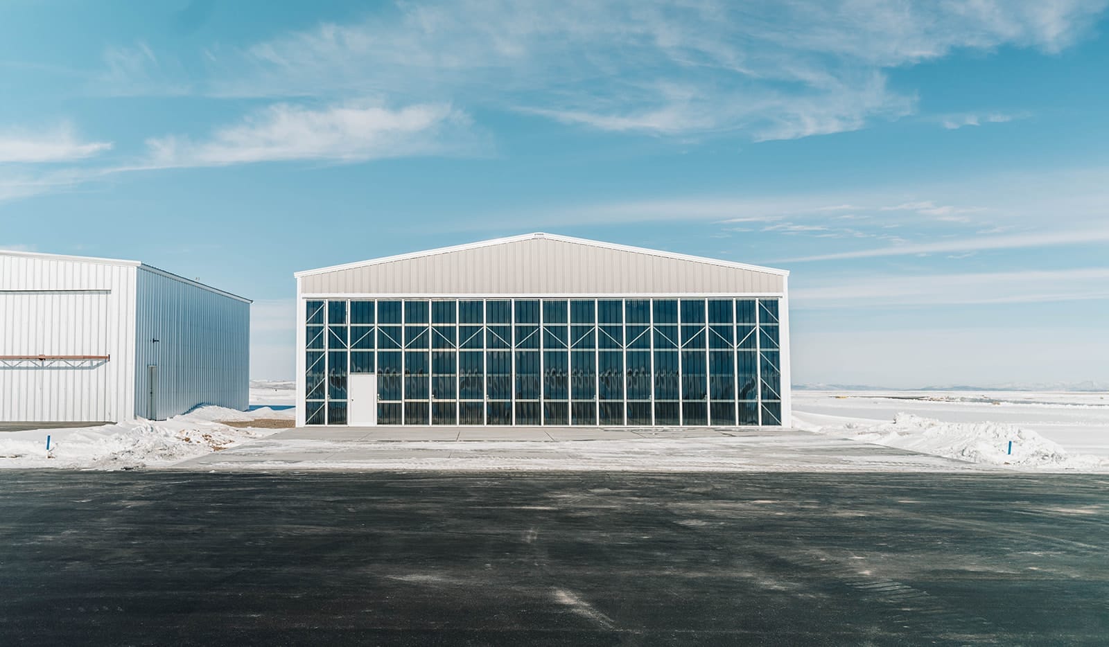 Aircraft Hangar with Transparent Panels in Evanston, WY - MBMI Metal ...
